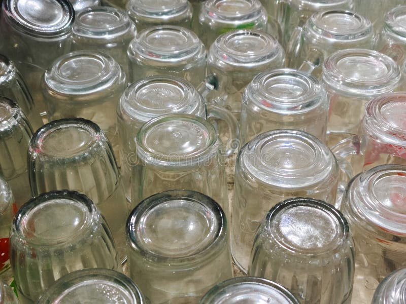 Close-up of Neatly Arranged Upside-down Glass Cups on a Table, Creating ...