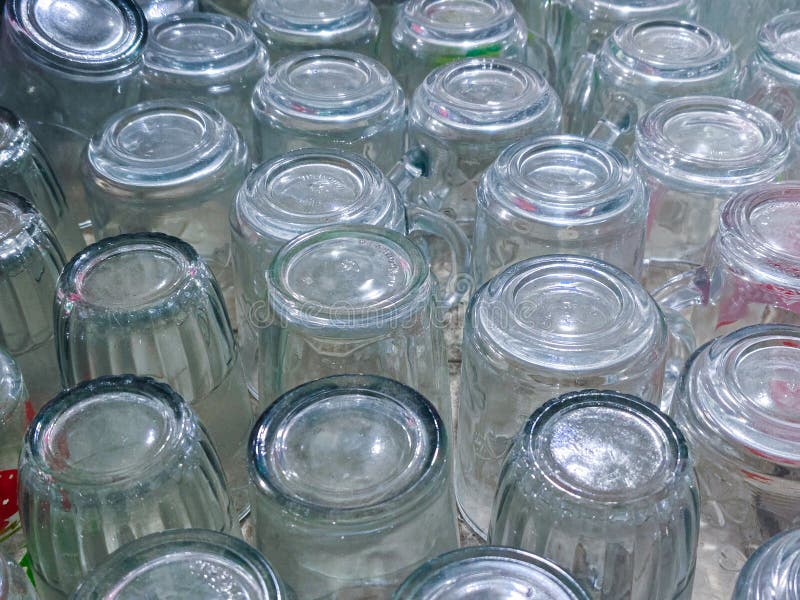 Close-up of Neatly Arranged Upside-down Glass Cups on a Table, Creating ...