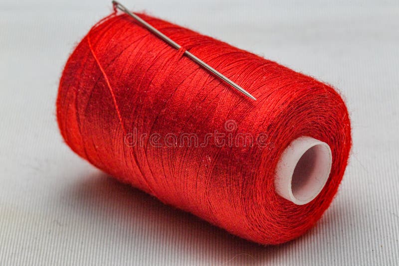Close Up of Needle and Red Thread Stock Image - Image of background ...