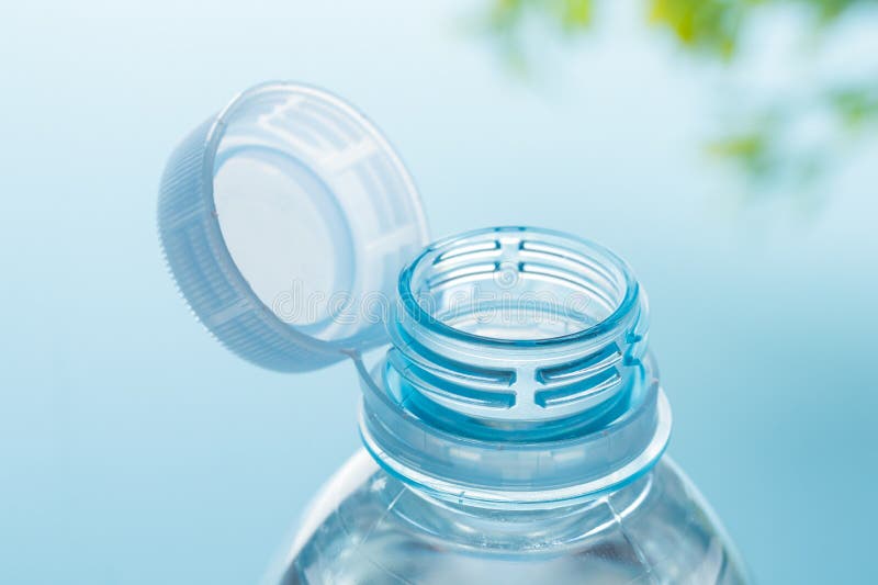 Close Up of New Cap Attached To Plastic Bottle, Connected To the Neck ...