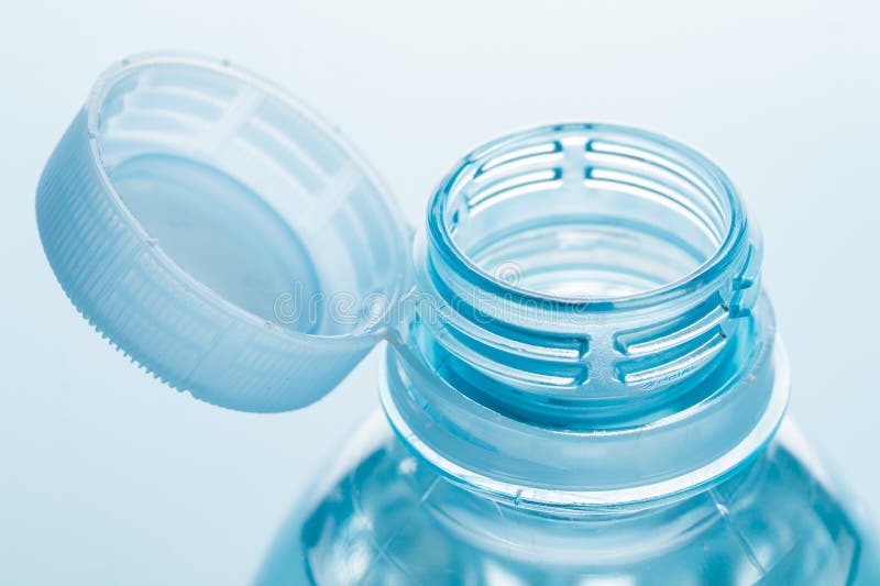 Close Up of New Cap Attached To Plastic Bottle, Connected To the Neck ...