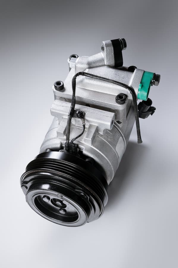 Close-up New Car Air Conditioning Compressor on Grey Background Stock ...