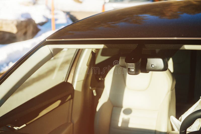 Close-up of New Car with Sensor on the Rear View Mirror for the Lights ...