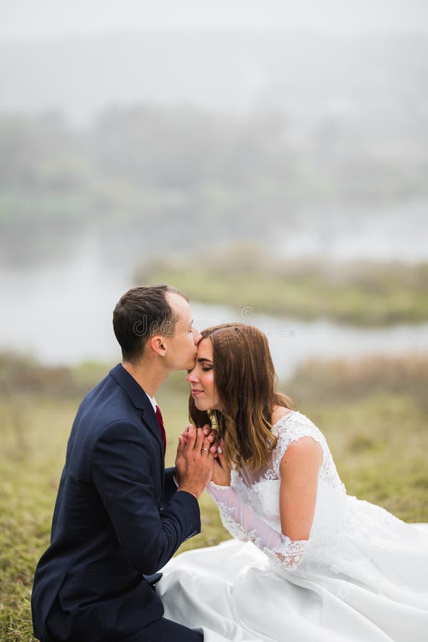 Close Up of a Nice Young Wedding Couple Stock Image - Image of husband ...