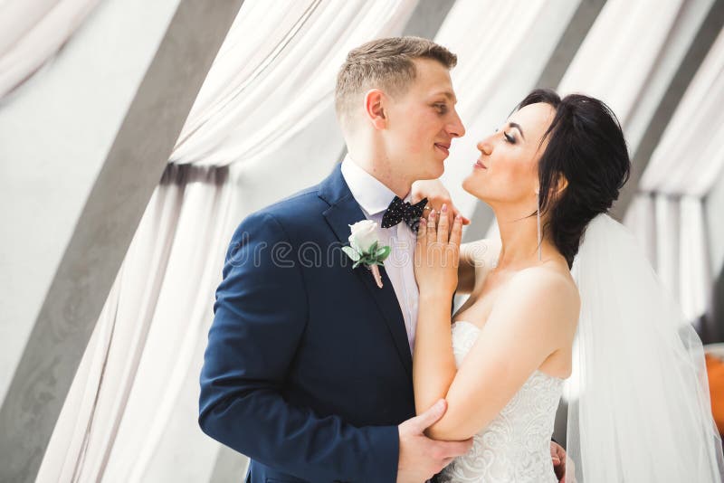Close Up of a Nice Young Wedding Couple Stock Image - Image of bouquet ...
