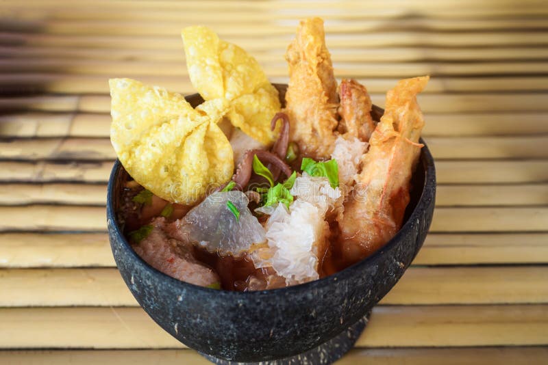 Close Up Noodle Soup with Seafood in Coconut Shell Stock Photo - Image ...