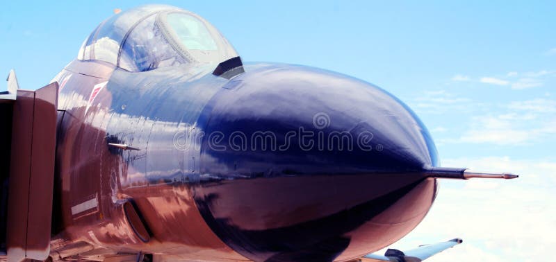 A Close Up Of The Nose Of A Jet Fighter Stock Image - Image of clouds ...