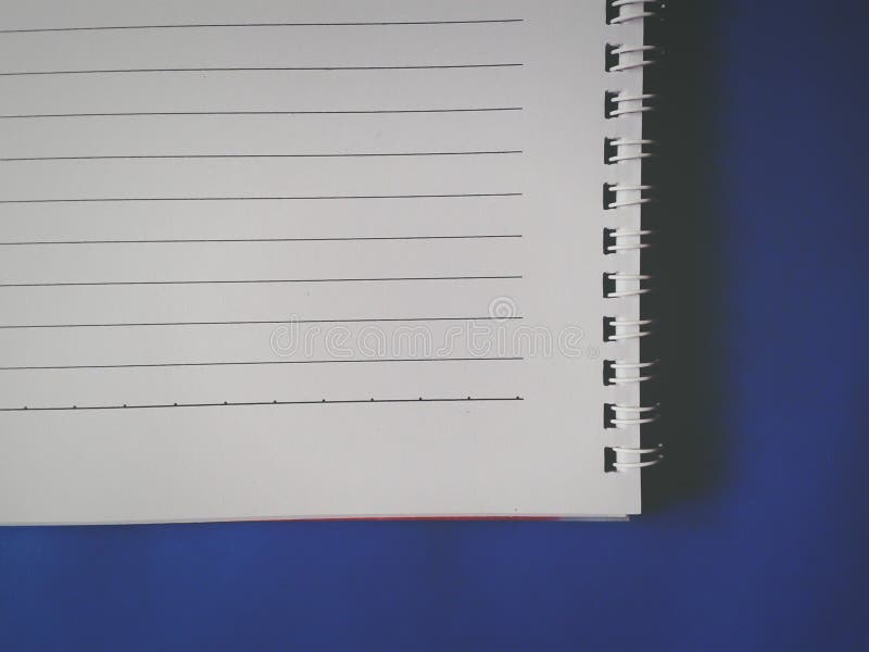 Notebook on Blue Background Stock Photo - Image of note, write: 127559114