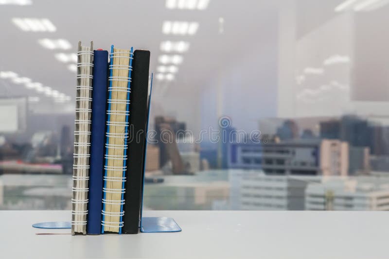 Notebook with Bookend on Shelf in Office Stock Image - Image of fashion ...