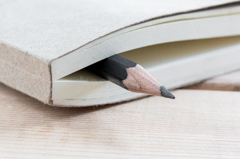 Close-up Notebook and Pencil Stock Photo - Image of crumpled, creative ...