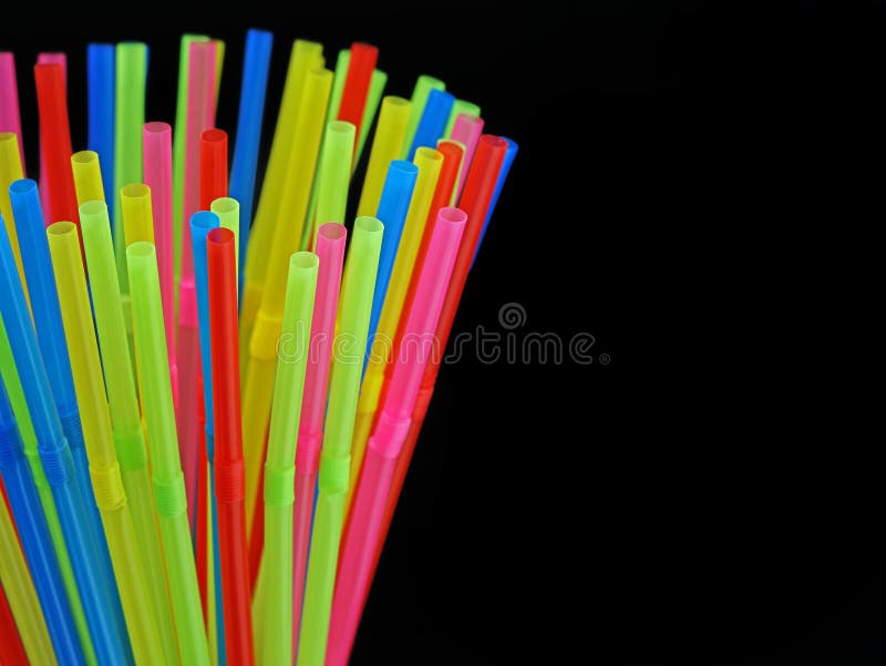 Close Up Od Different Colored Plastic Drinking Straws Isolated on Black ...