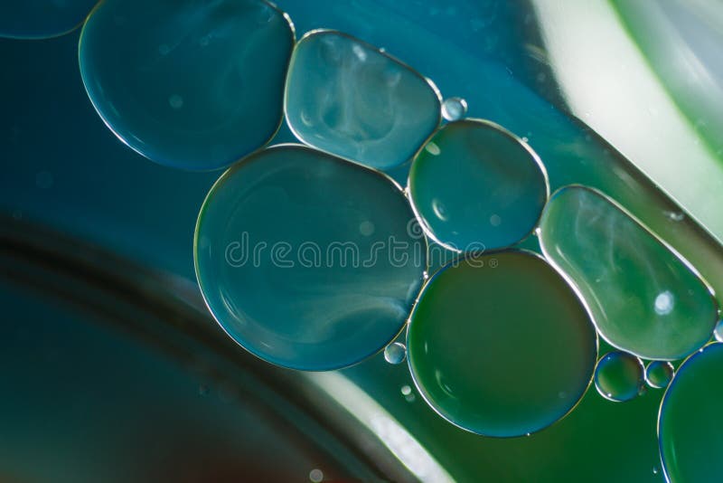 Close Up Oil Drops Floating on Water Surface Stock Image - Image of ...