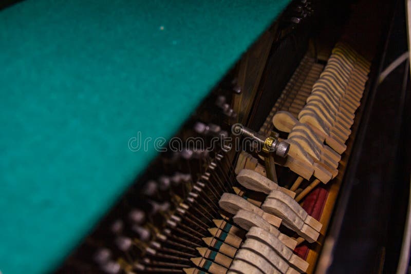Close Up of Old Broken Dusty Piano from the Inside. Hammers in ...