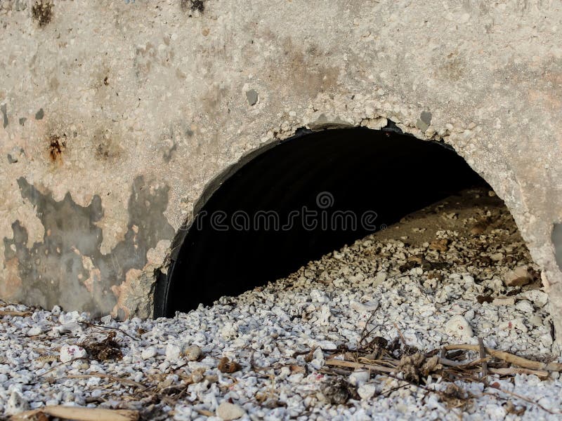 Close-up of an Old Culvert Under a Roadway Prevent Water from Pooling ...