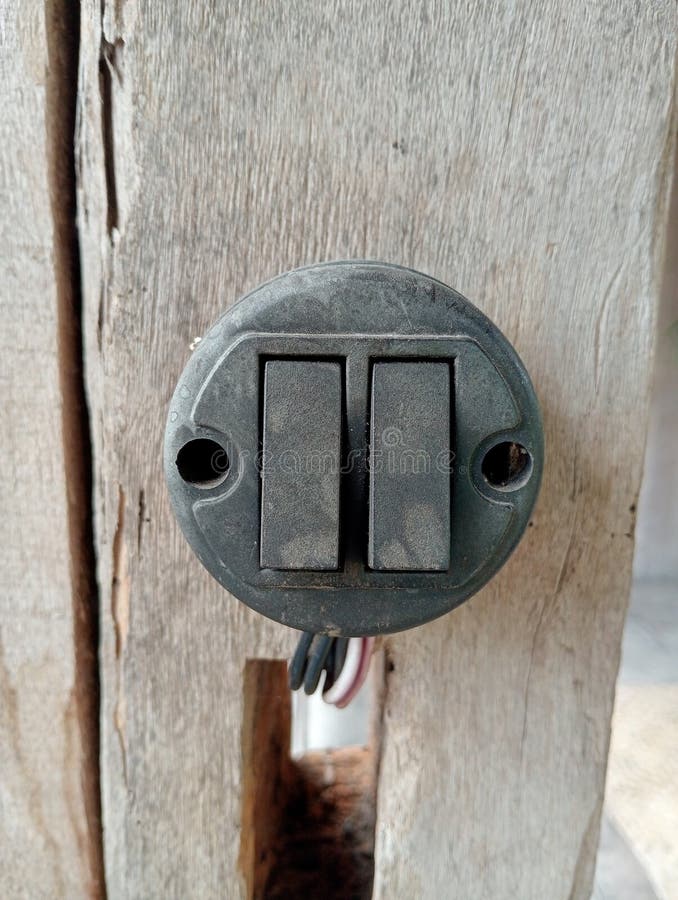Vintage Black Round Light Switch Mounted on Wood Stock Illustration ...