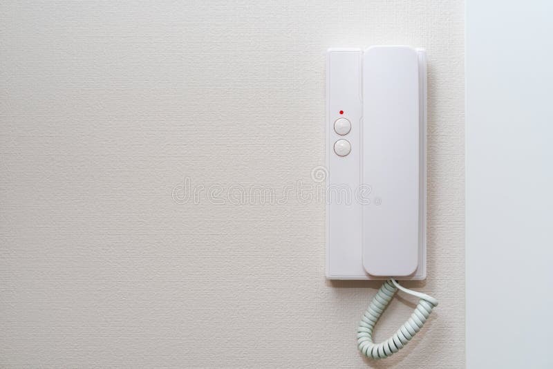 Close Up Old Intercom System in the Apartment Hanging on the White Wall ...
