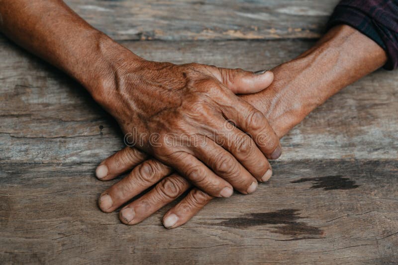 Close-up of Old Man S Hands Resting on Wood Stock Photo - Image of ...