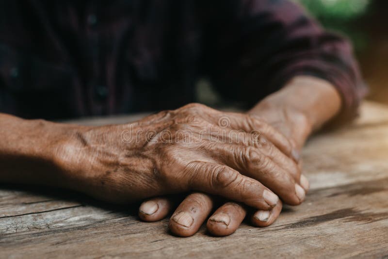 Close-up of Old Man S Hands Resting on Wood Stock Photo - Image of ...