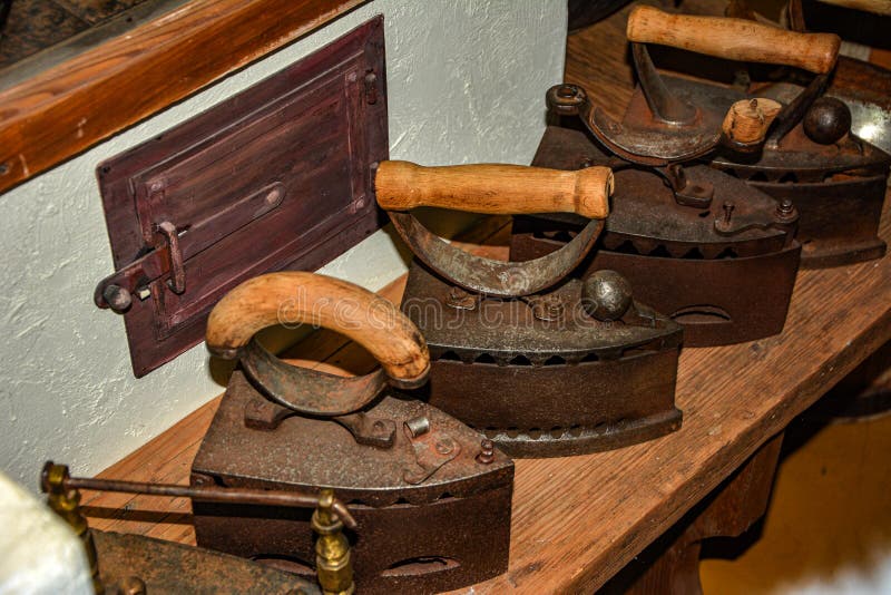 Close-Up of Old Metallic Charcoal Iron on Table Editorial Stock Photo ...
