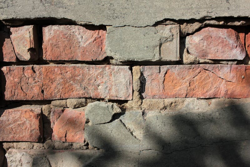 Old Red Brick Wall with Falling Off Cement Background and Shadows from ...