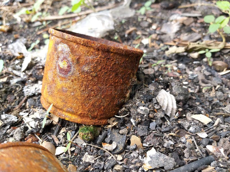 Old Rusty Can on the Ground Stock Photo - Image of refuse, ground ...