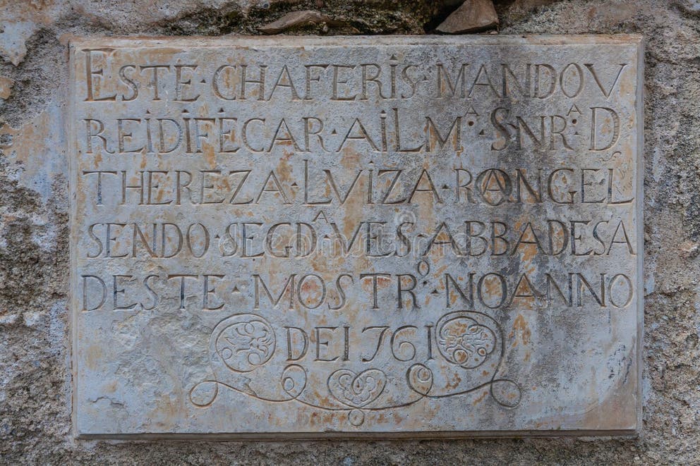 A Close-up of an Stone Plaque with an Inscription in an Ancient Script ...