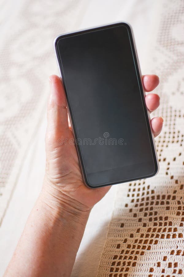 Close Up of Old Woman Hand Holding Mobile Phone. Stock Photo - Image of ...