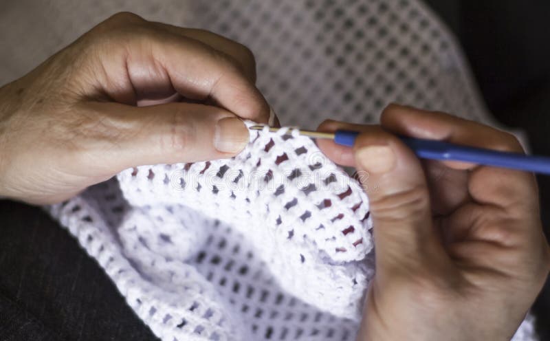 Close-up of an Old Woman`s Hands are Crocheted with White Threads Stock ...