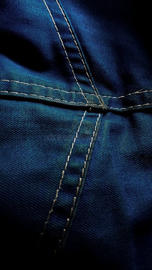 Close-up Old Work Uniform with Scuffs on a Lowercase Seam of Blue Denim ...