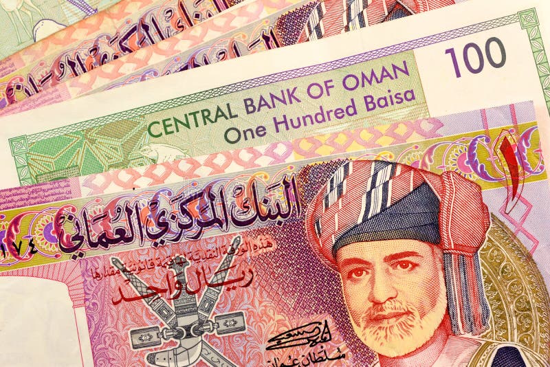 An Omani One Rial Bank Note With A United Arab Emirates Five Dirham ...