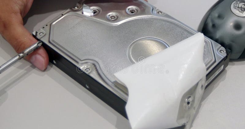Close-up of an Open Hard Disk Drive in the Hands of a Technician Stock Photo - Image of close ...