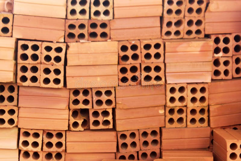 Close Up of the Orange Clay 4 Hole Brick Stack Stock Image - Image of ...