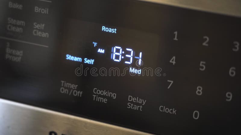 Close Up of Oven Display Flickering, Control Panel Blinking ...