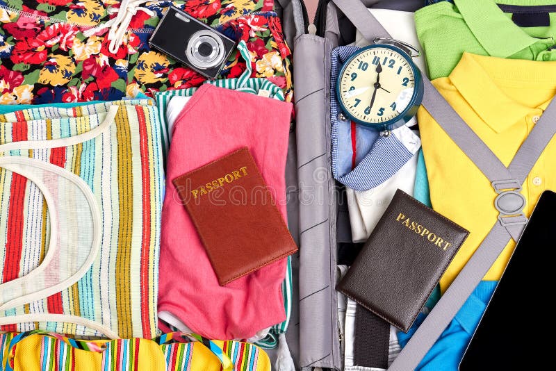Close Up of Packed Suitcase. Stock Image - Image of device, luggage ...