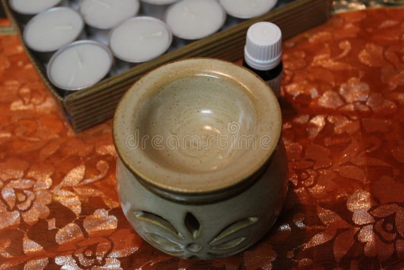 Tea Lights, Natural Essential Oil and Candle Diffuser Stock Image ...