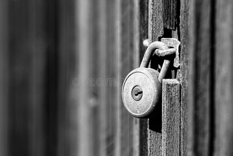 Close-up of Padlock on Door in Black and White Stock Photo - Image of ...