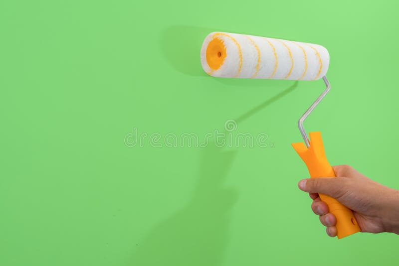 Close-up of Painter Arm Painting a Wall with Paint Roller Stock Image ...