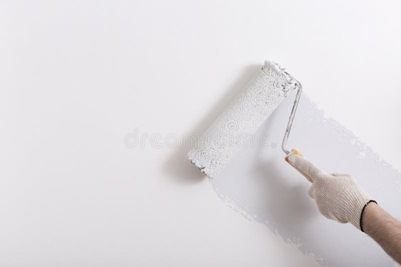 Close Up of Painter Arm Painting a Wall with Paint Roller Stock Image ...