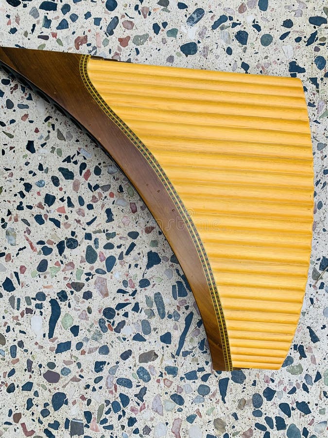 Close Up Pan Flute a Musical Instrument Lying on Square-edged Flooring ...