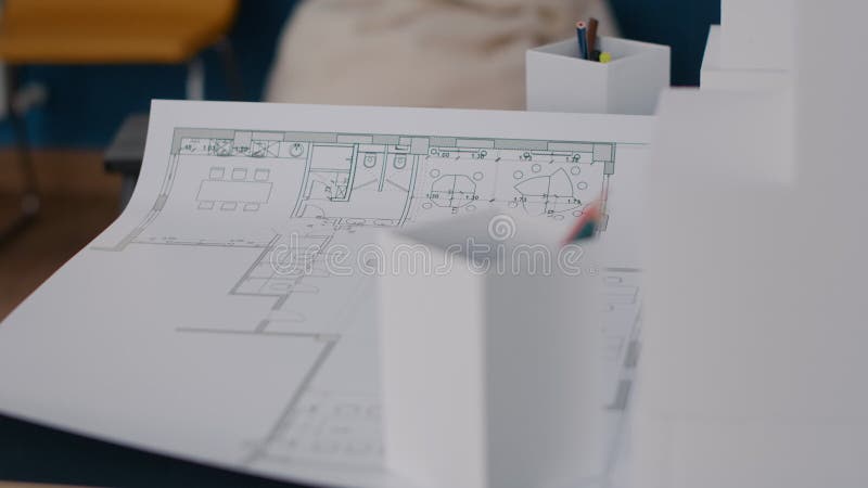 Close Up of Paper with Blueprints Plans on Table in Architectural ...