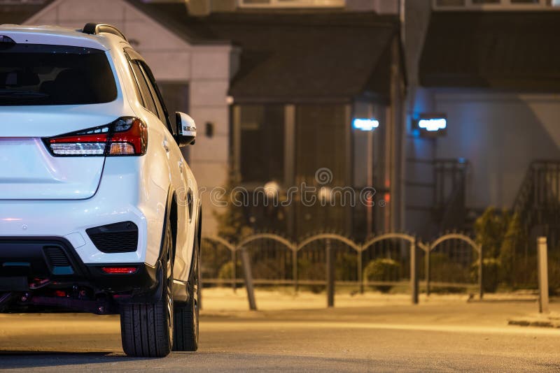 Close Up of Parked Car on Roadside at Night Stock Image - Image of ...