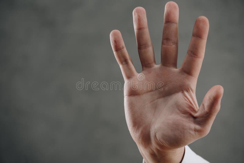 Close-up Partial View of Human Palm on Grey Stock Photo - Image of sign ...