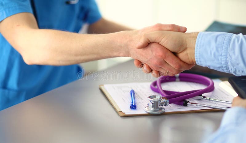 Close Up of Patient and Doctor Taking Notes Stock Image - Image of ...
