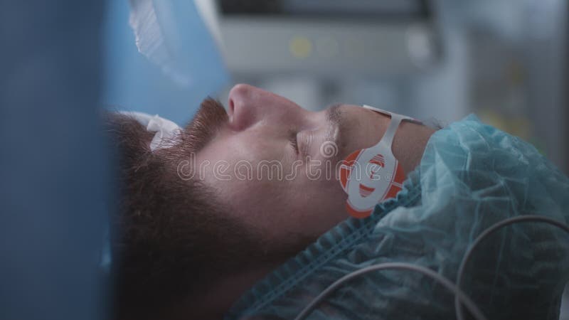 Close Up of Patient Lying on Surgical Table Under Anesthesia with ...