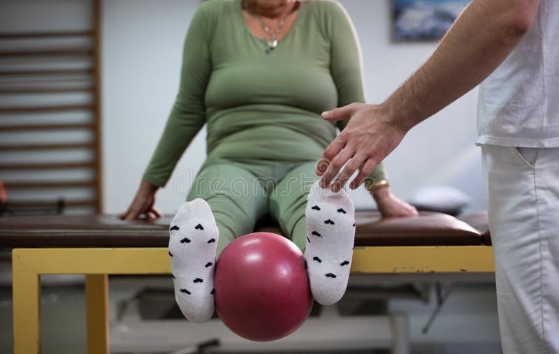 Leg Therapy Exercise with Ball Stock Image - Image of injury ...