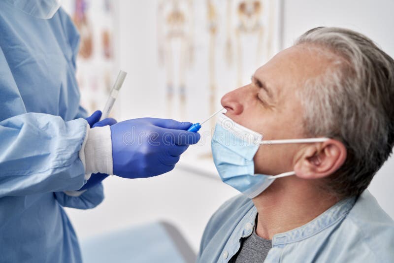 Close Up of Patient during Taking Sample for Coronavirus Testing Stock ...