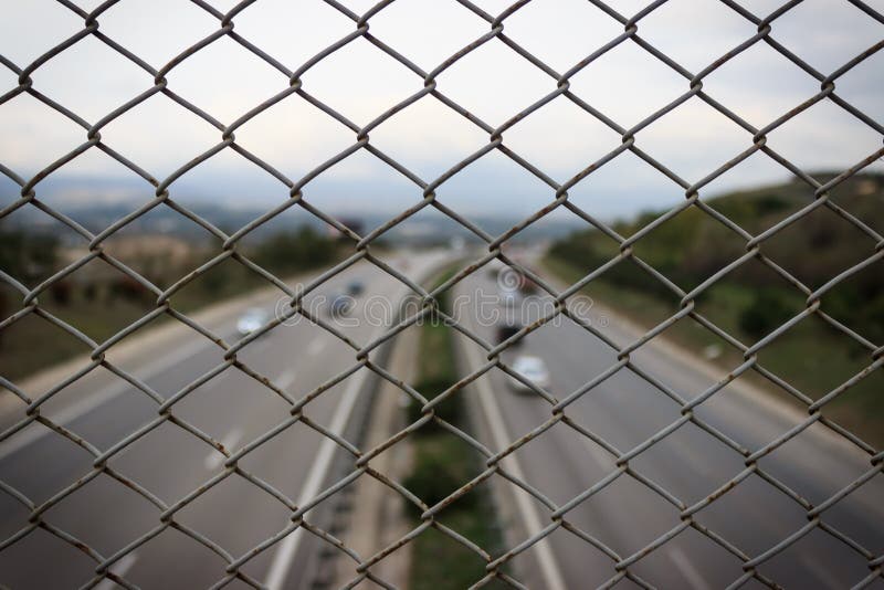 Pattern of Wire Mesh Fence. Highway Landscape at Background Stock Photo ...