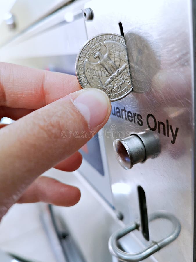 Paying with a Quarter Coin in a Machine Stock Image - Image of load ...