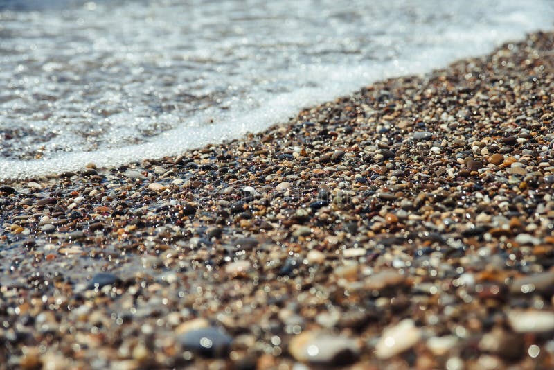 Close Up of a Pebble Beach with the Sea. Stock Photo - Image of ...