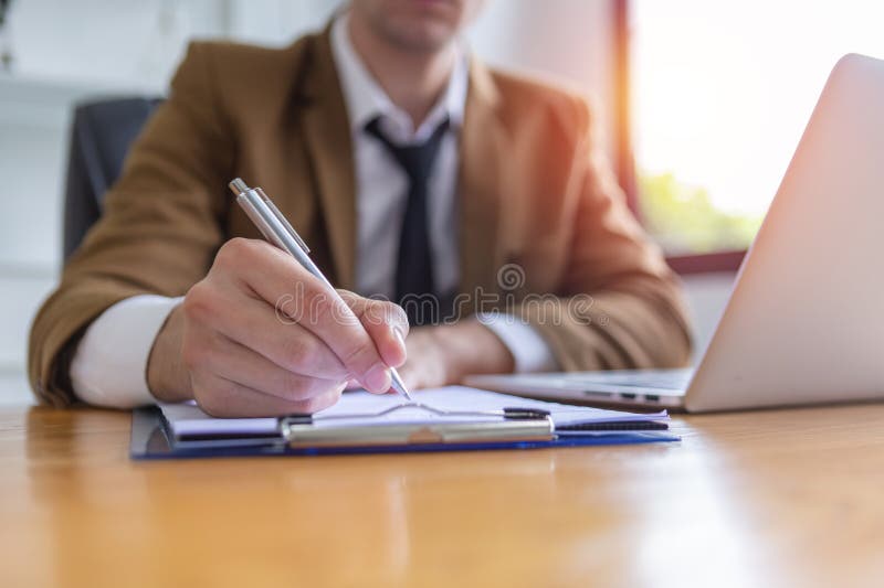 Close Up a Pen, Businessman Writing Information Note on Paperwork at ...